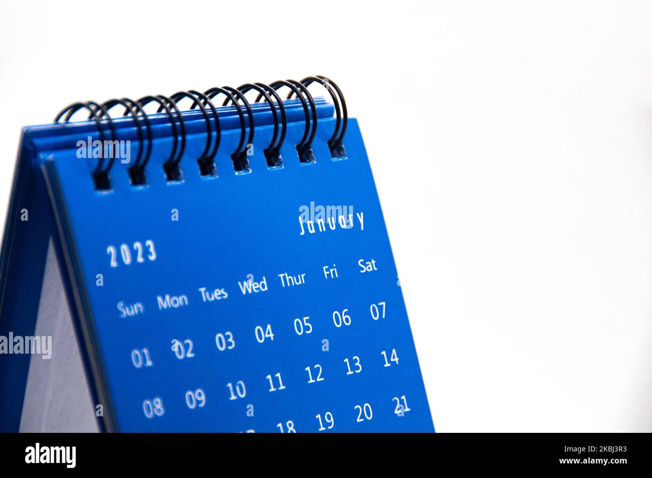 January 2023 blue desk calendar on white background with customizable ...