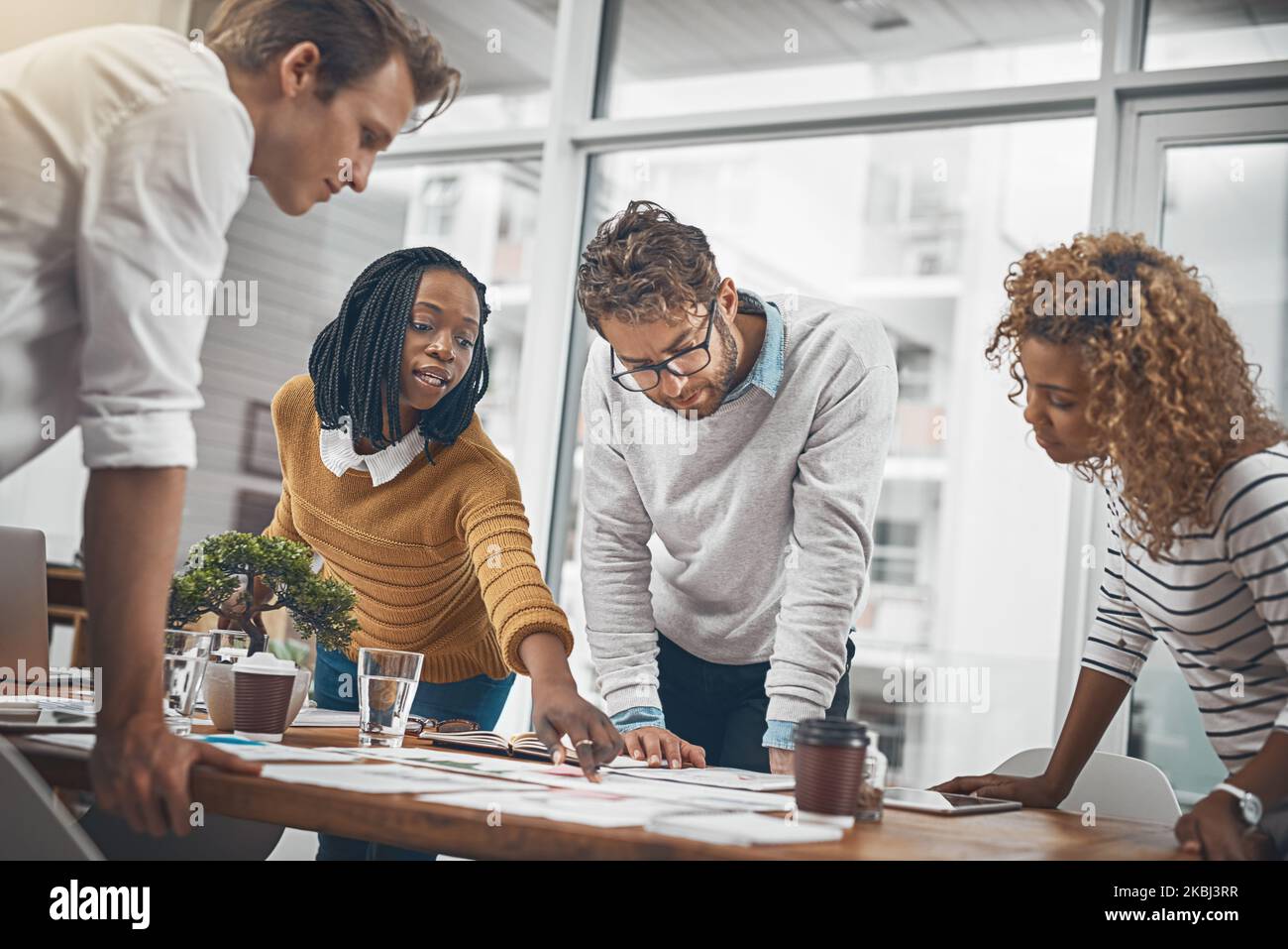 This is our biggest challenge so far. a group of businesspeople having ...