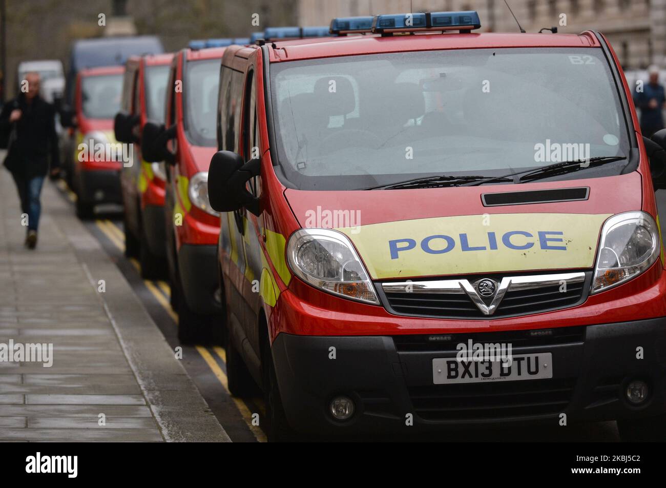 A line of Police vans in Central London. On Saturday, 25 January 2020 ...