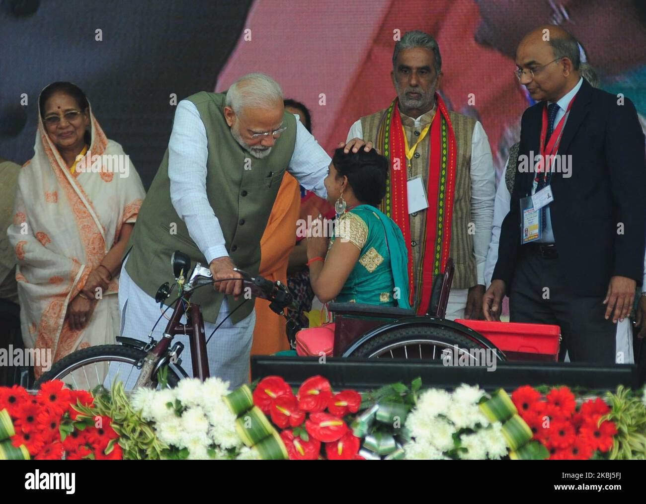 indian prime minister Narendra Modi distributes distribute assistive ...