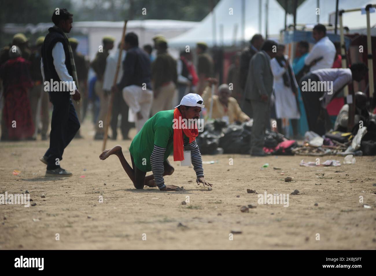 A handicapped man returns after listening the speech of Indian Prime ...