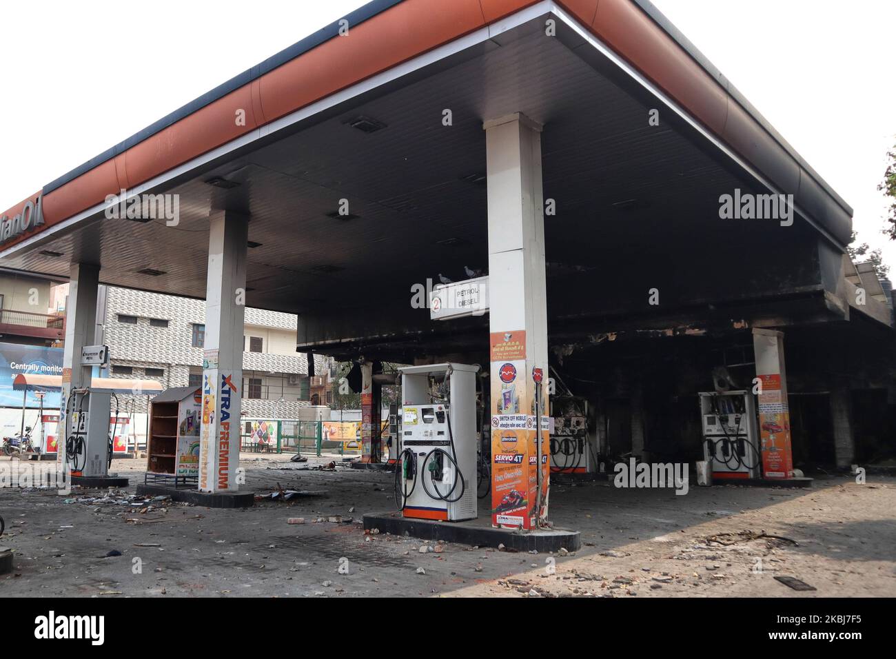 Scene of charred petrol pump after it was set on fire by a mob during ...