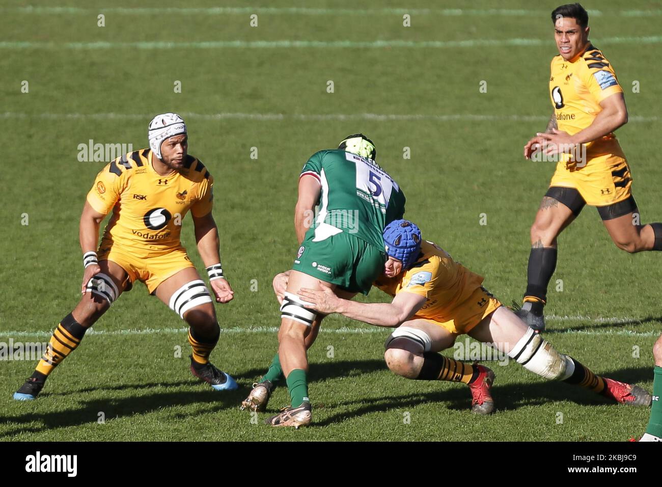 Adam Coleman of London Irish getting tackled by Thibaud Flament of ...