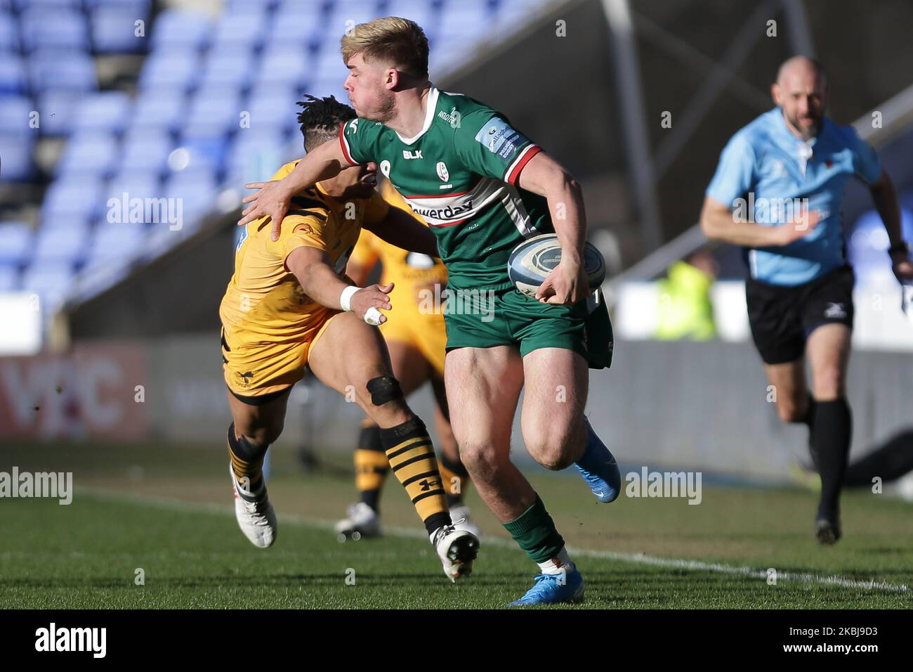 Ollie Hassell Collins of London Irish holding off Marcus Watson of ...
