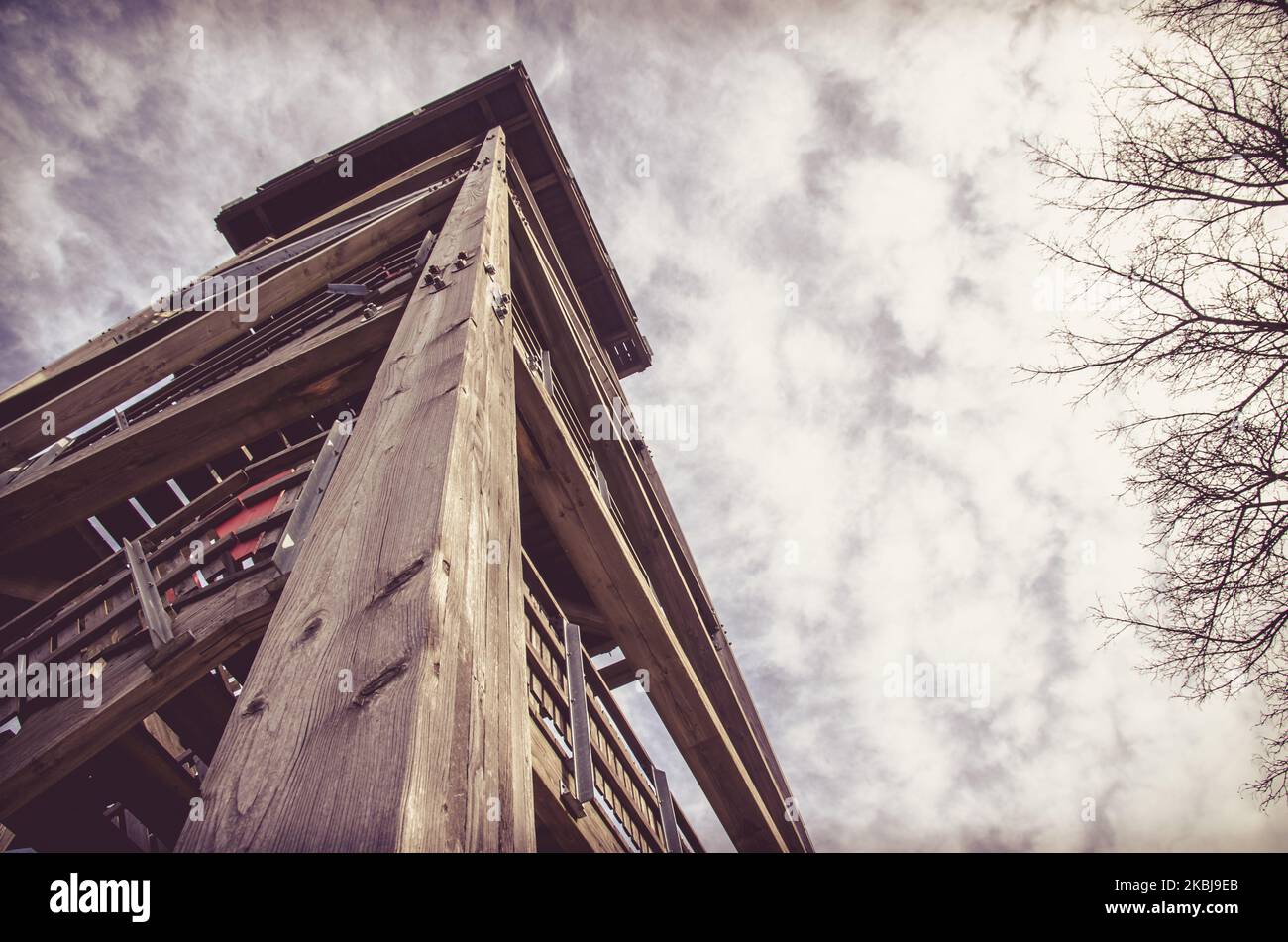 high wooden observation tower with dramatic sky Stock Photo - Alamy