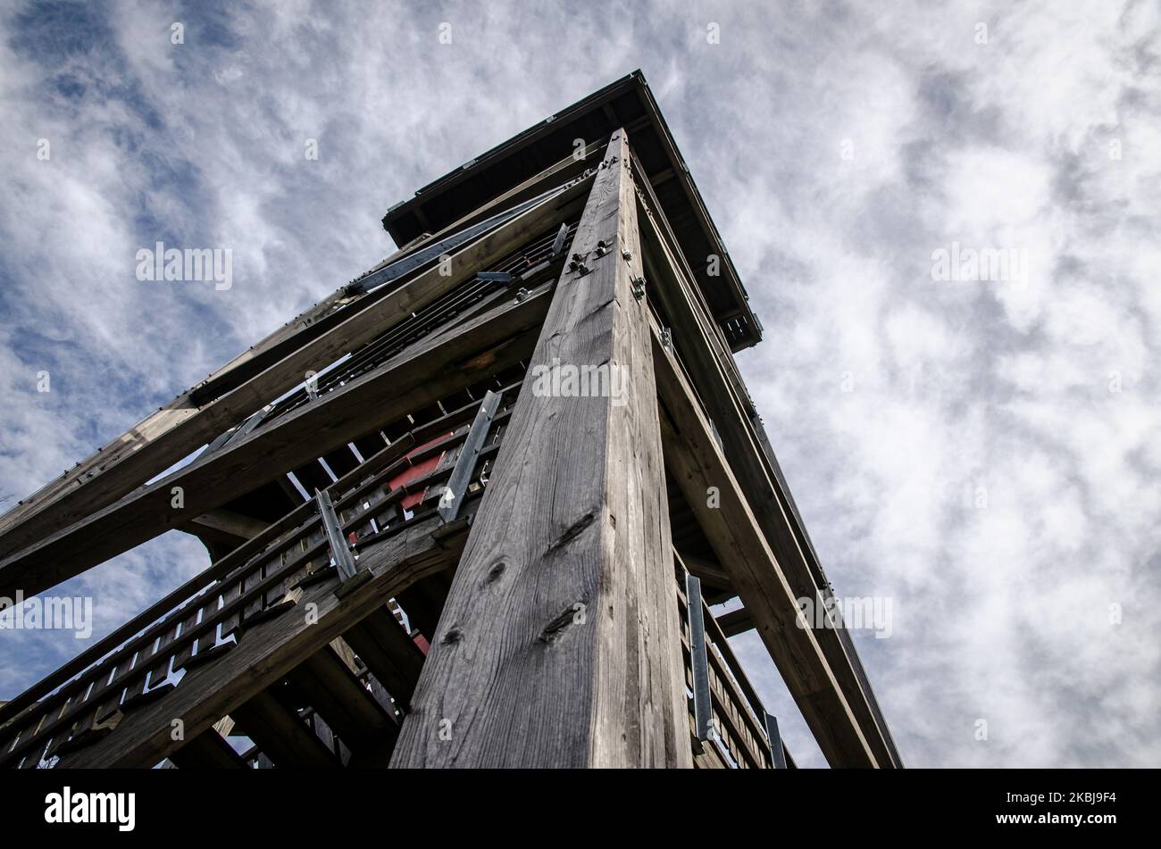 high wooden observation tower with dramatic sky Stock Photo - Alamy