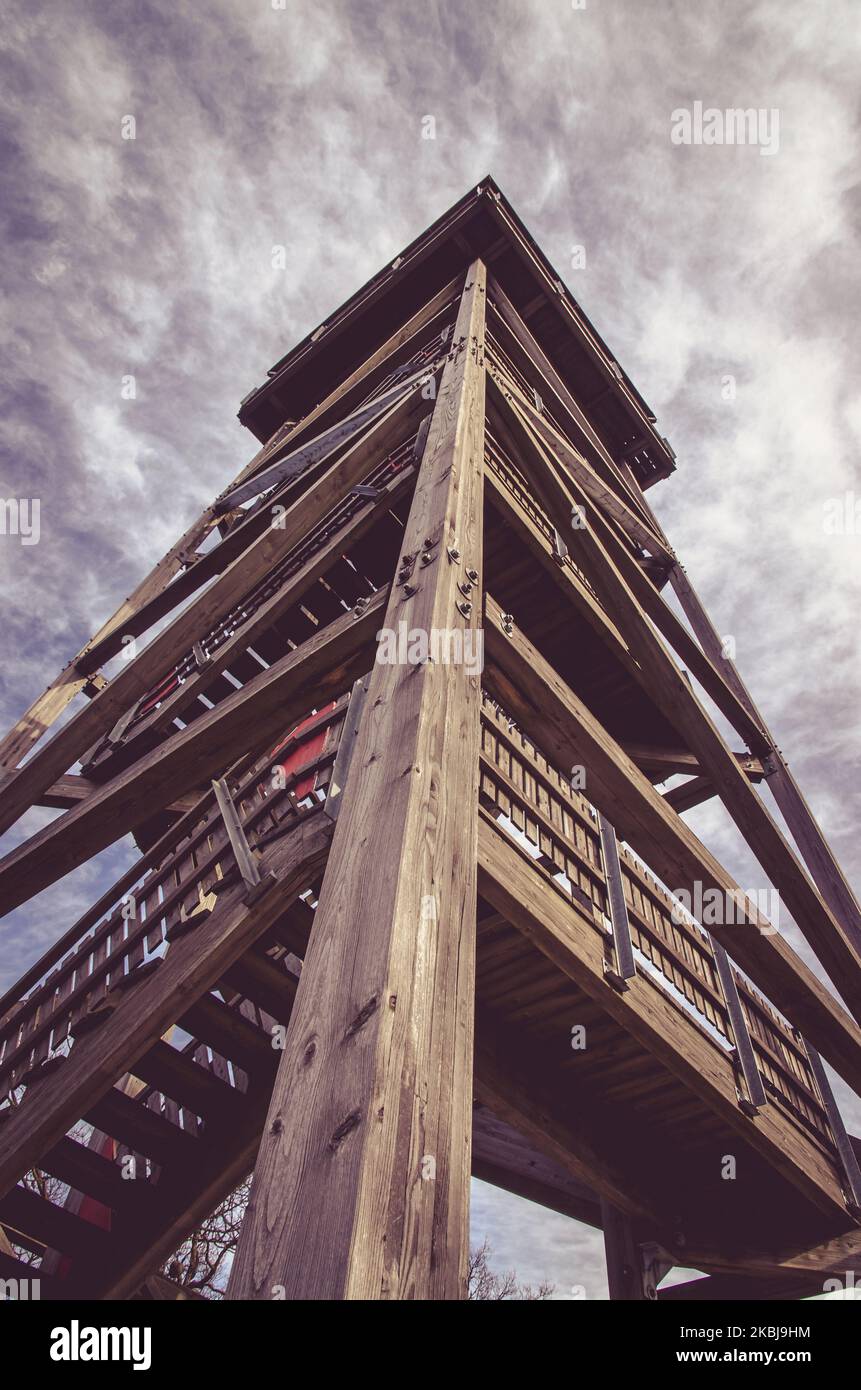 high wooden observation tower with dramatic sky Stock Photo - Alamy