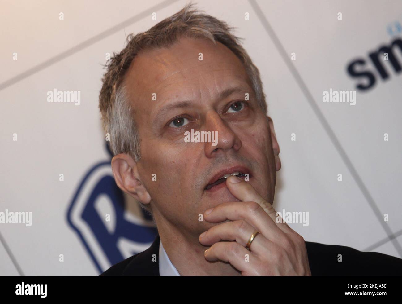 President and CEO of The Coca-Cola Company James Quincey looks on ...