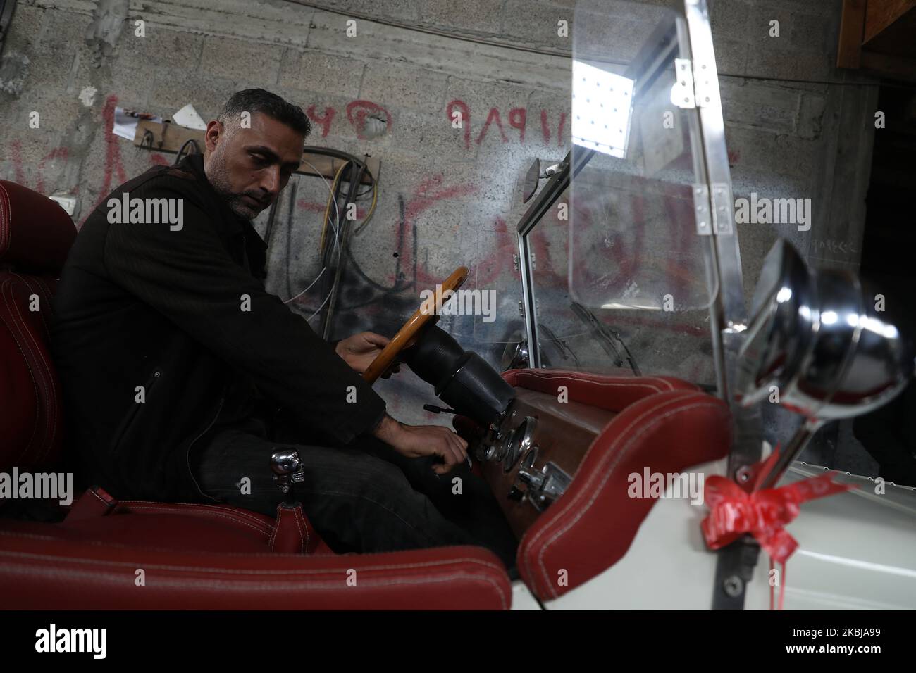 Munir Shindy, a 40-year-old Palestinian who restores old cars as a ...