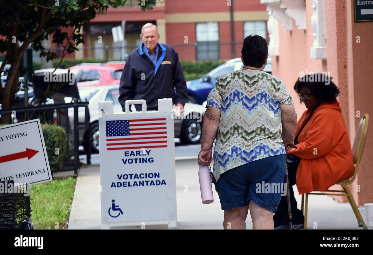 People arrive for the first day of early voting in Florida's 2020 ...