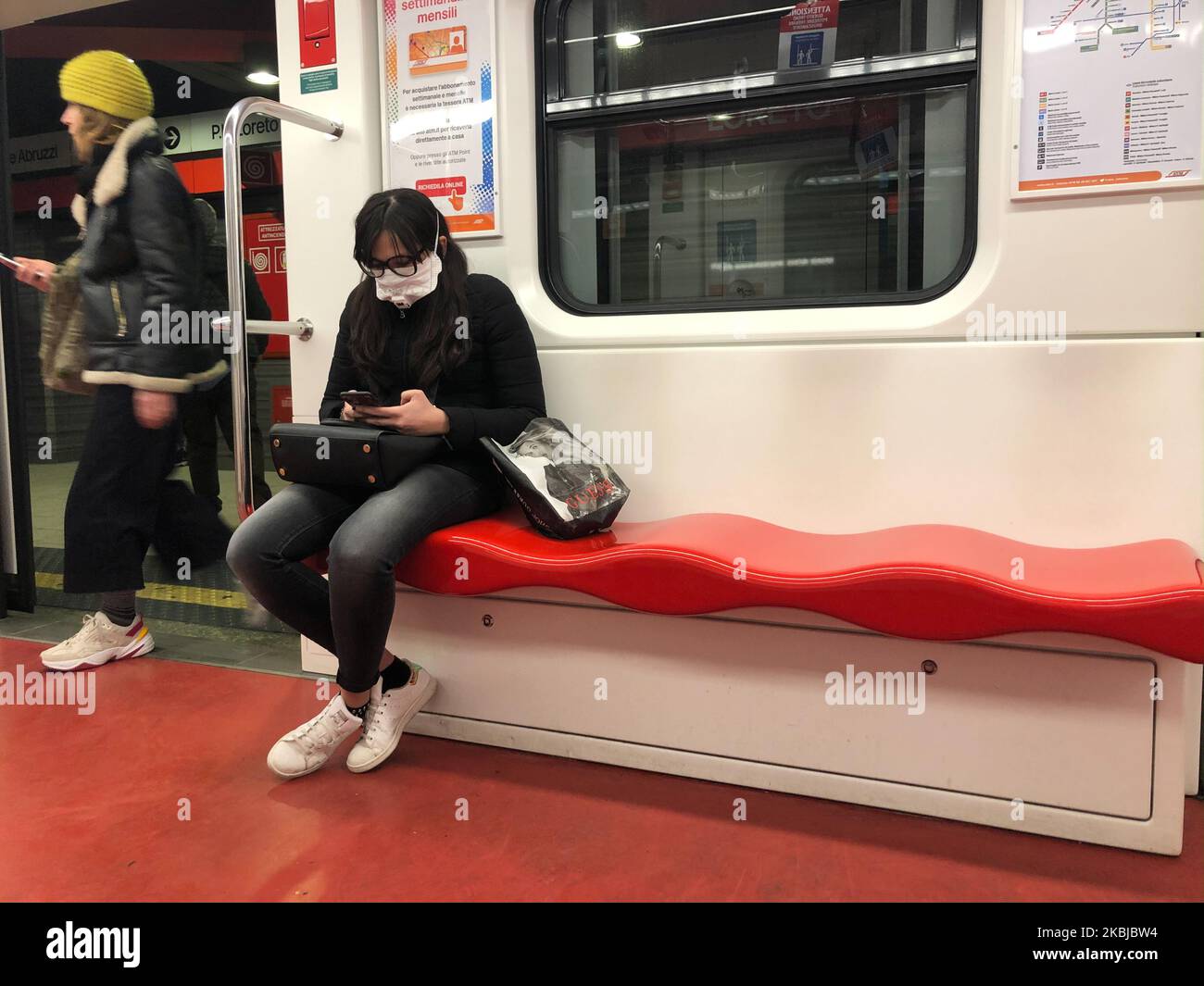 Metro passenger wearing a protective mask against Coronavirus, Milan ...