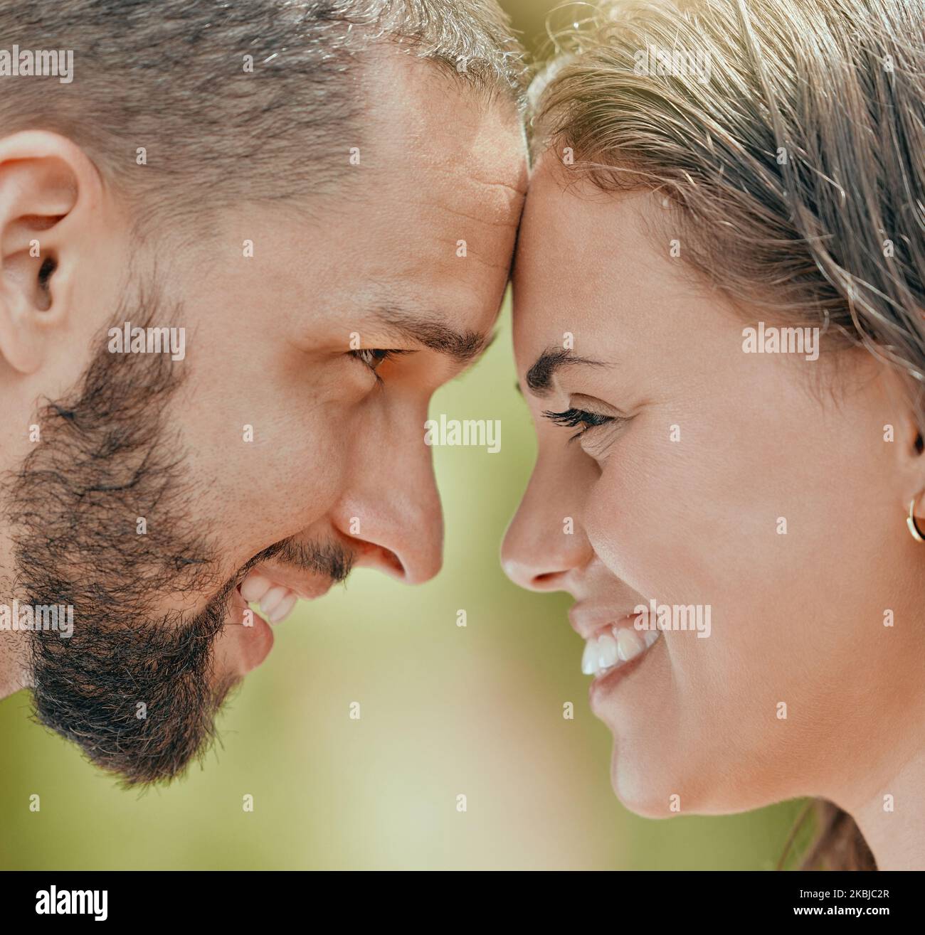 Young couple embracing touching foreheads hi-res stock photography and ...