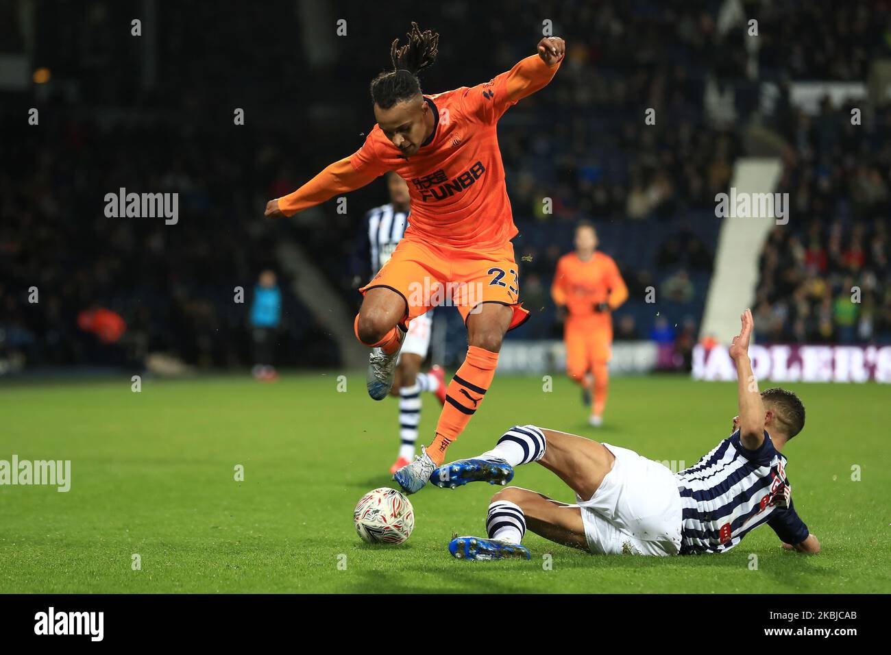 Valentino Lazaro of Newcastle United and Romaine Sawyers of West ...