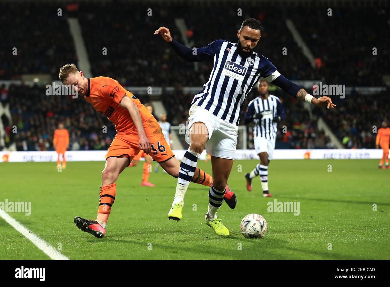 Sean Longstaff of Newcastle United and Kyle Bartley of West Bromwich ...
