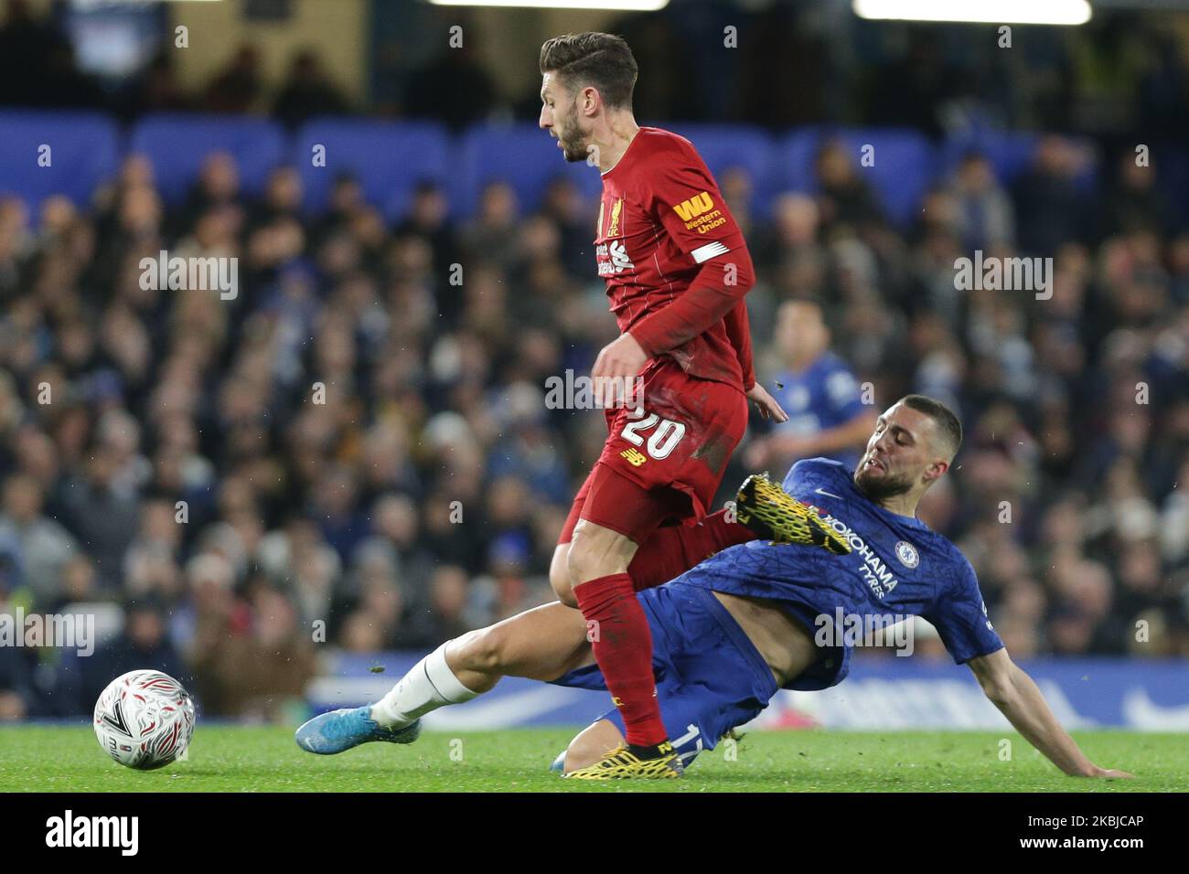 Adam Lallana of Liverpool avoiding the tackle from Mateo Kovacic of ...