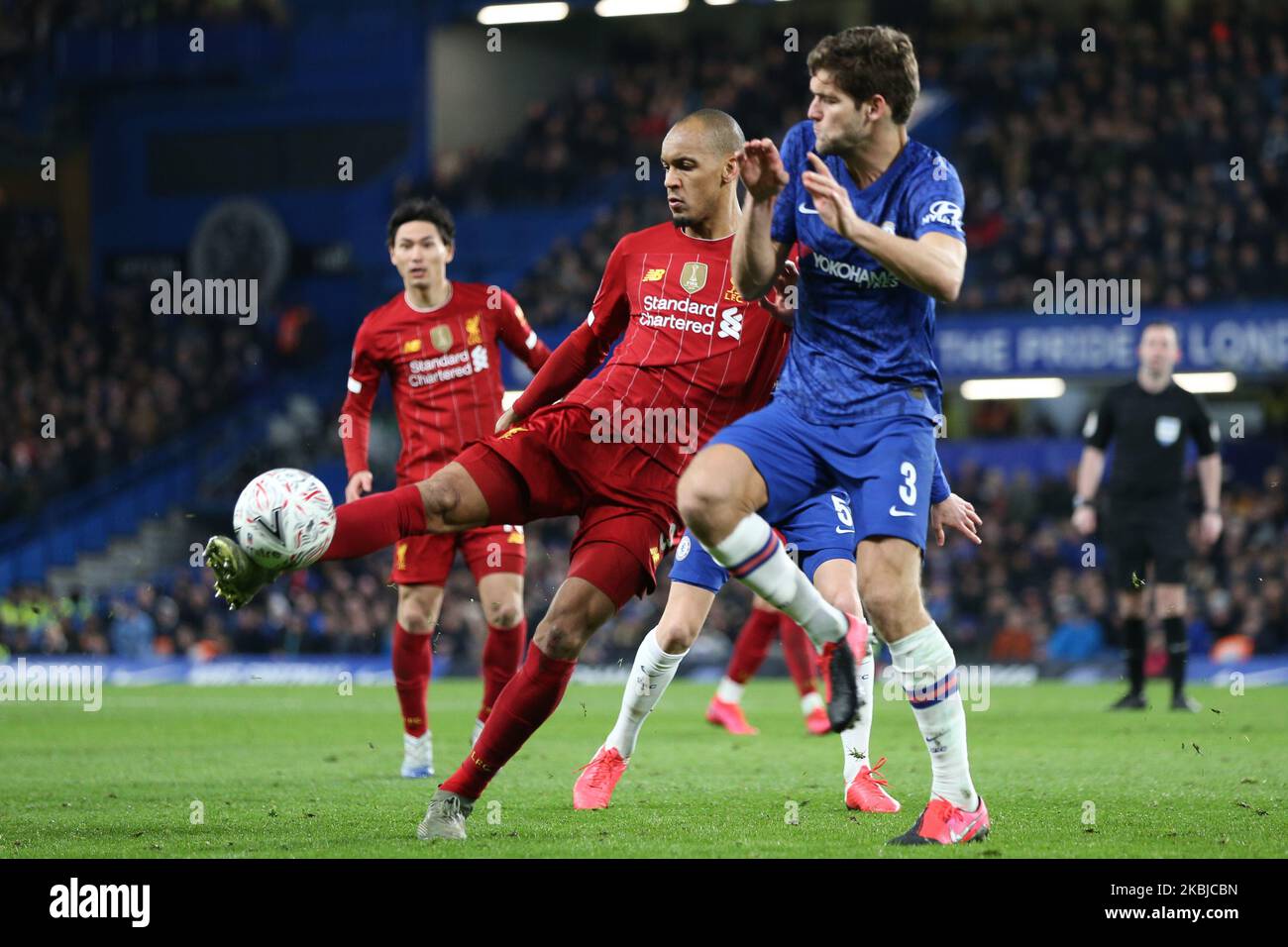 Fabinho of Liverpool passing the ball past Marcos Alonso of Chelsea ...