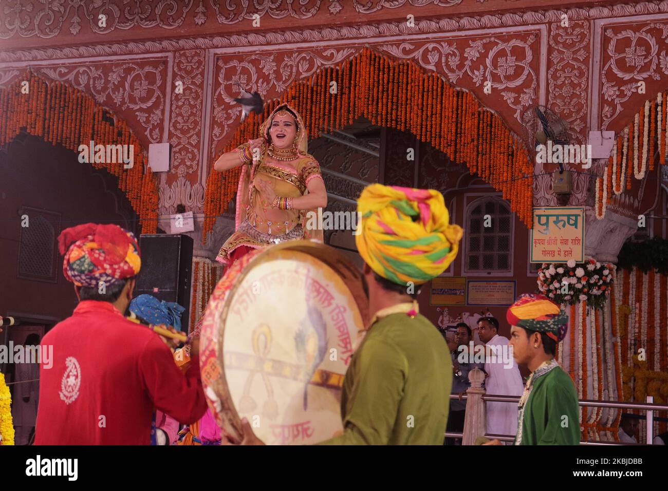 Folk artists perform during the Fag Mahotsav celebration at Govind Dev ...