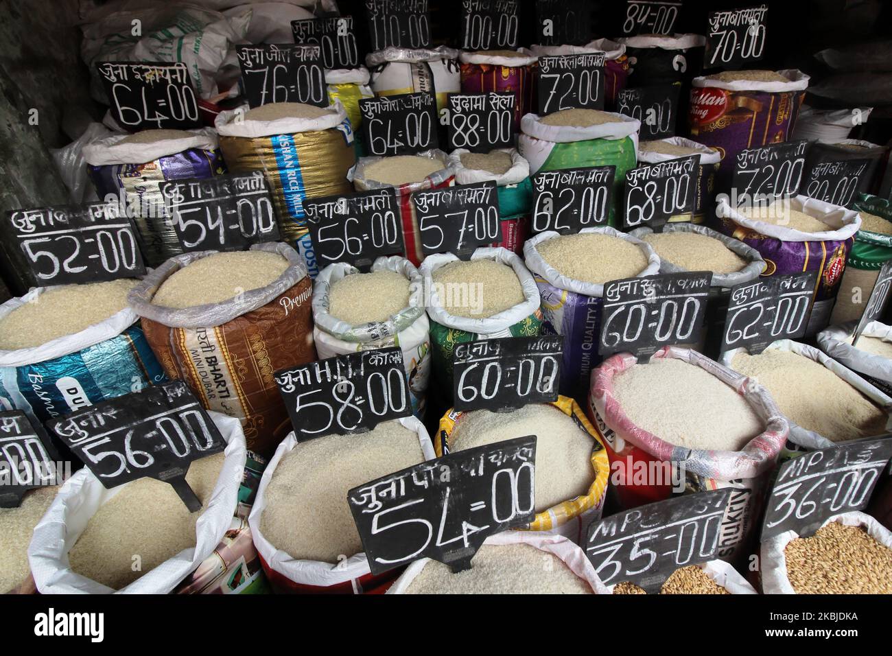 Price tags are displayed on bags of rice at a store on March 04, 2020 ...