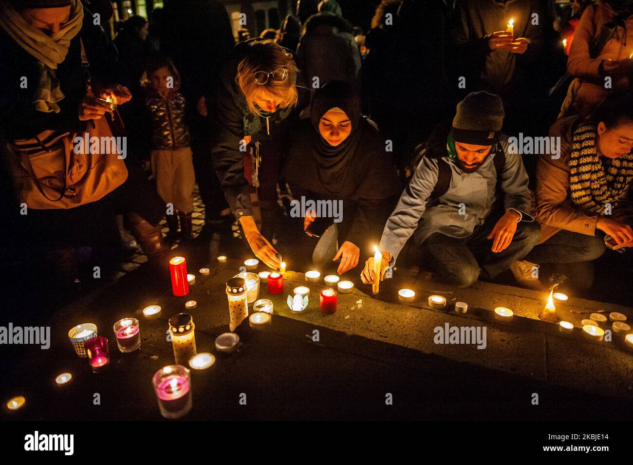 People are leaving the candles on the floor, during the demonstration ...