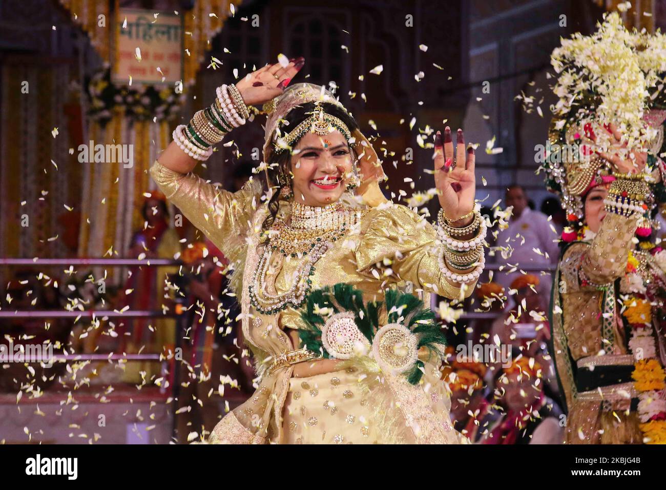 Jaipur: Artists dressed up as Lord Krishna and Goddess Radha as they ...