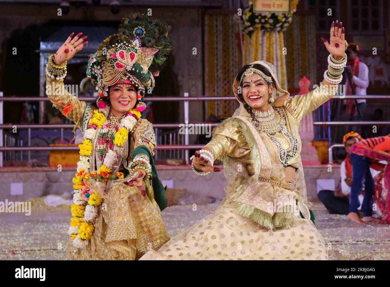 Jaipur: Artists dressed up as Lord Krishna and Goddess Radha as they ...