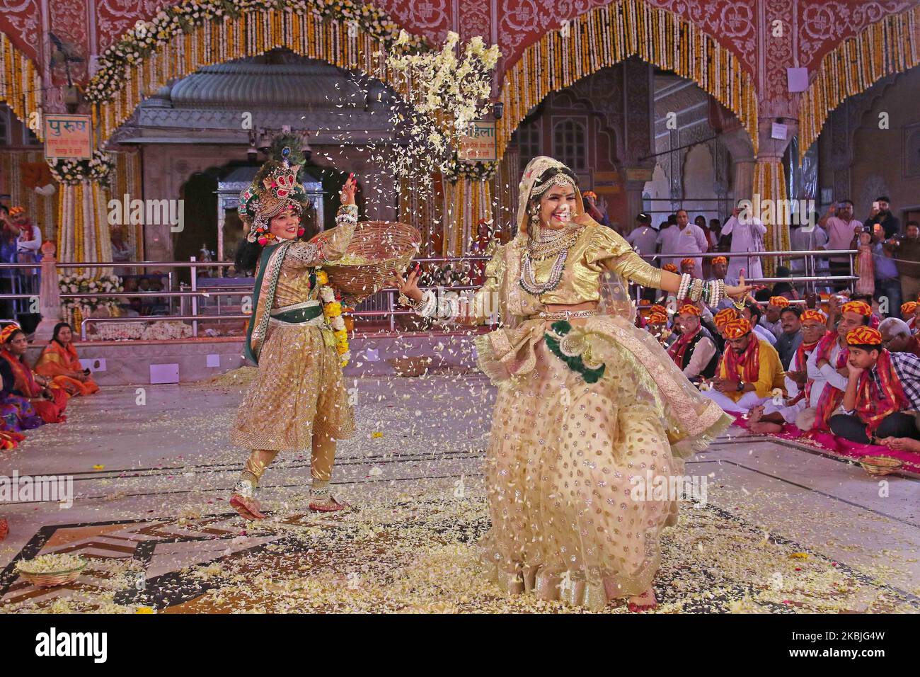 Jaipur: Artists dressed up as Lord Krishna and Goddess Radha as they ...