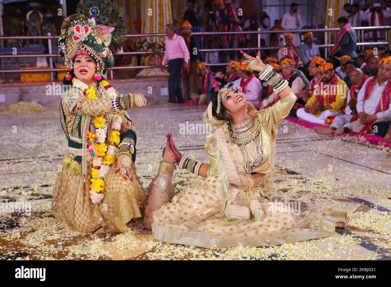 Jaipur: Artists dressed up as Lord Krishna and Goddess Radha as they ...