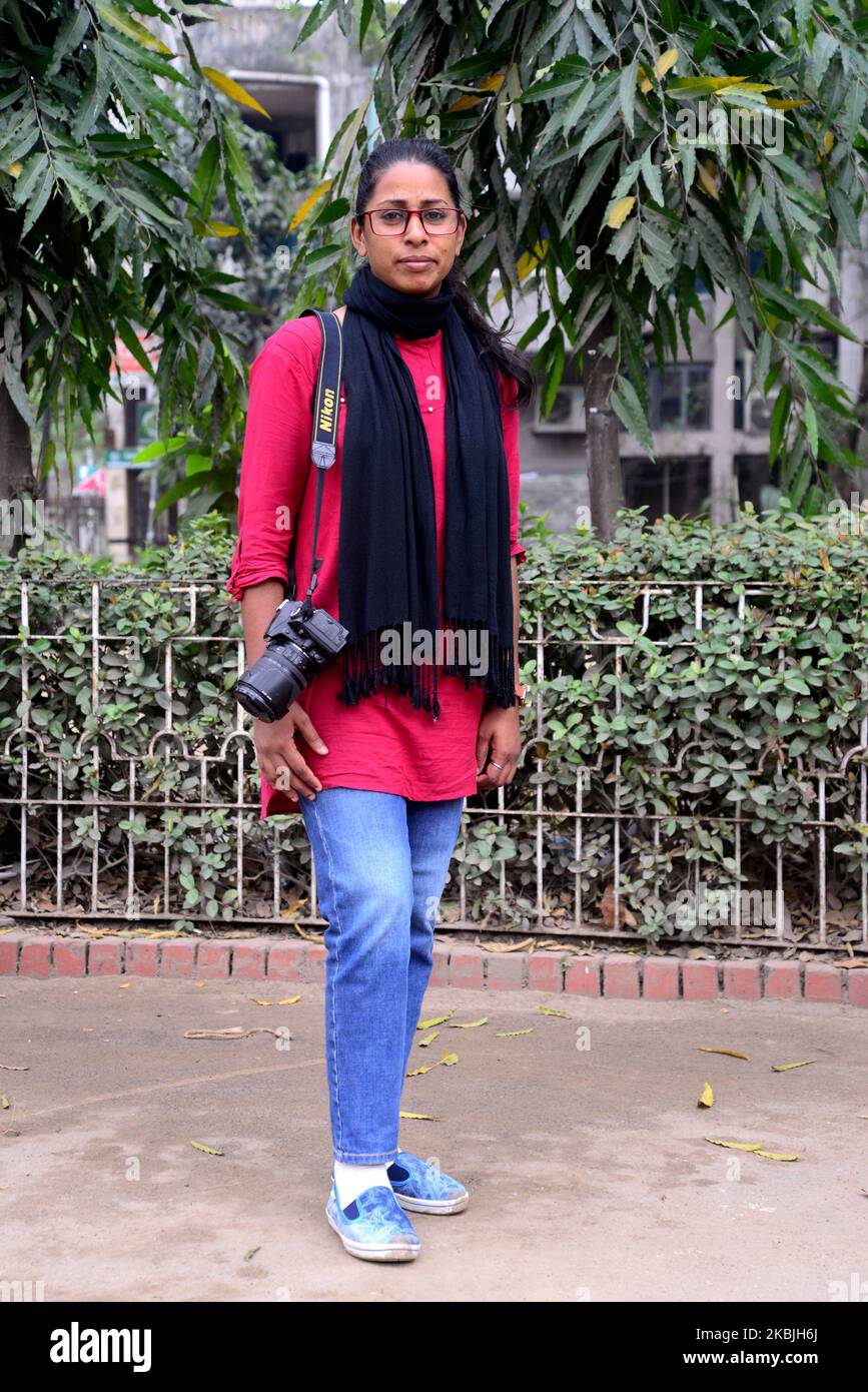Surovi Akter Riya, A Bangladeshi woman photojournalist poses for a ...