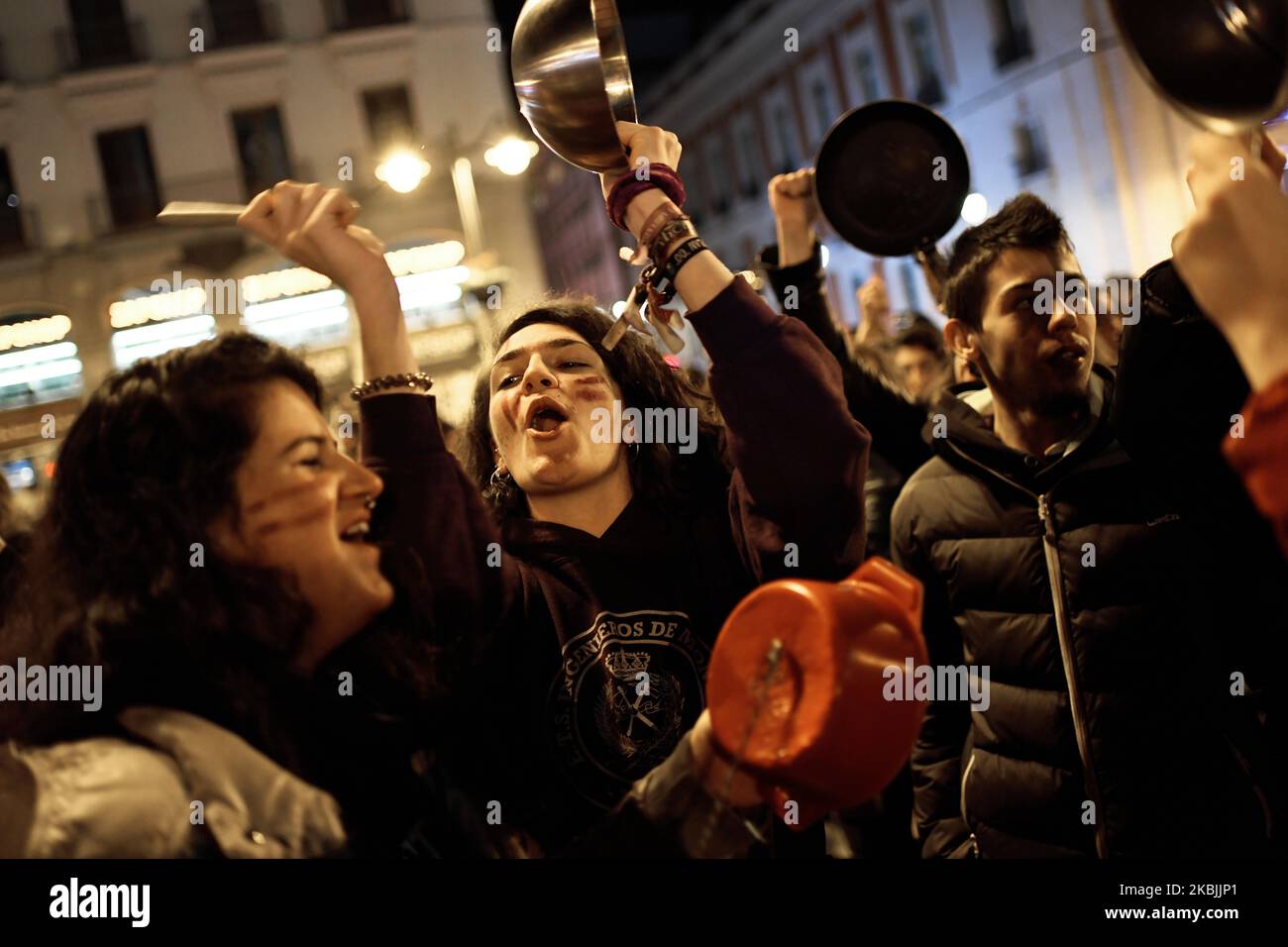 Women bang pots and pans shouting angry slogans during the cacerolada ...