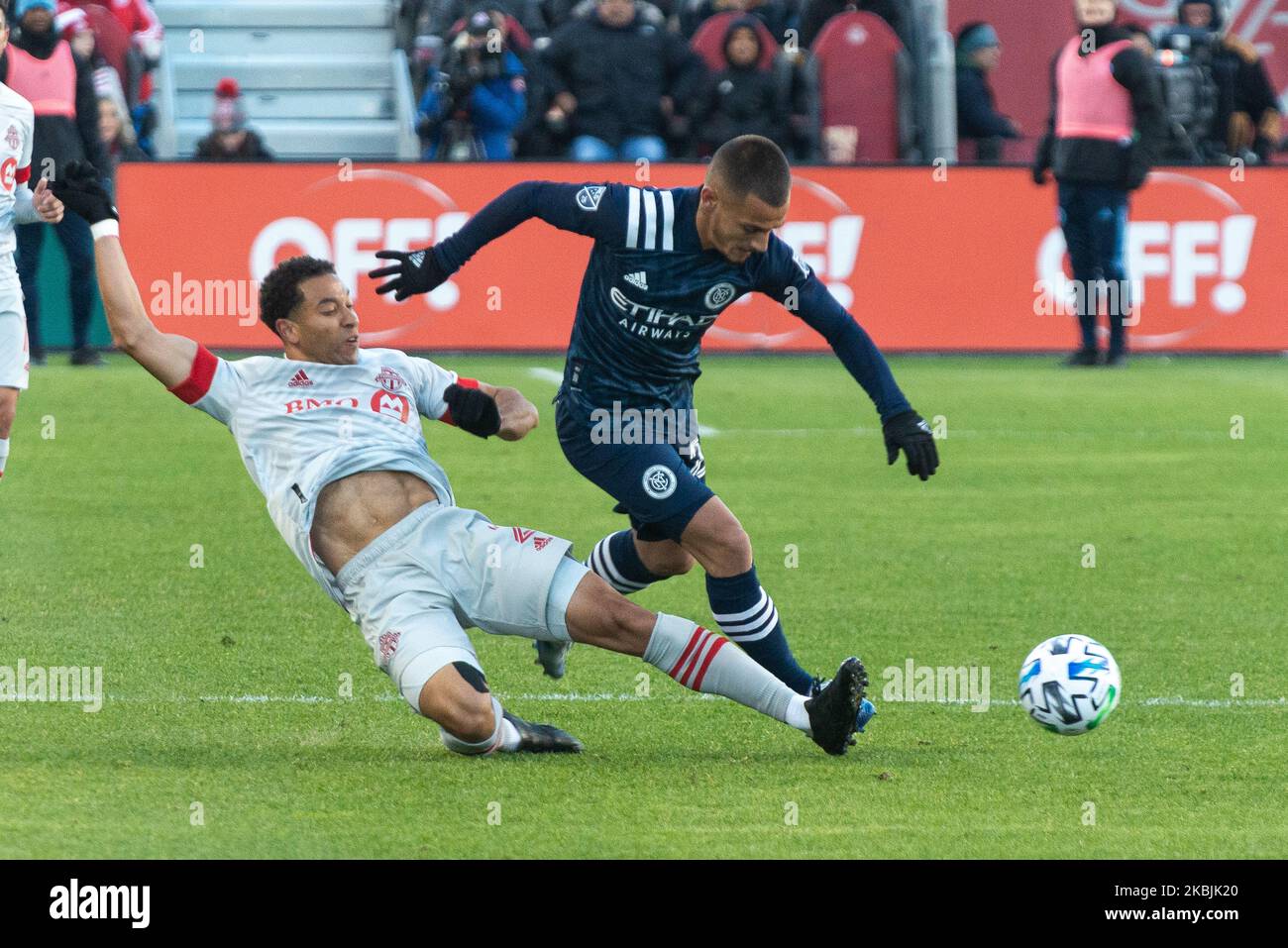 Justin Morrow #2 defender of the Toronto FC makes a tackle during the ...