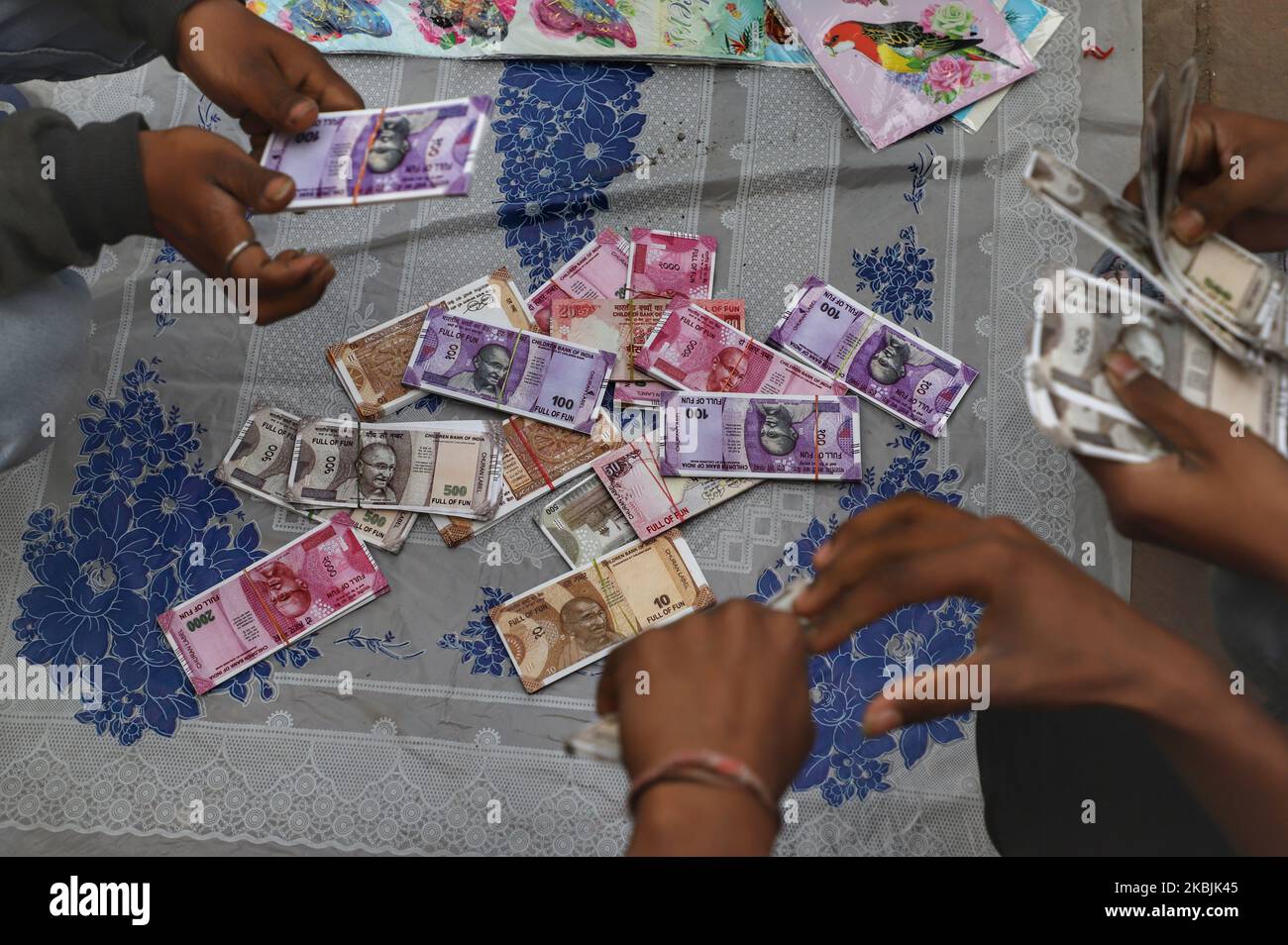 A vendor sells fake notes of Indian currency of Rs 50, Rs 100, Rs 500 ...