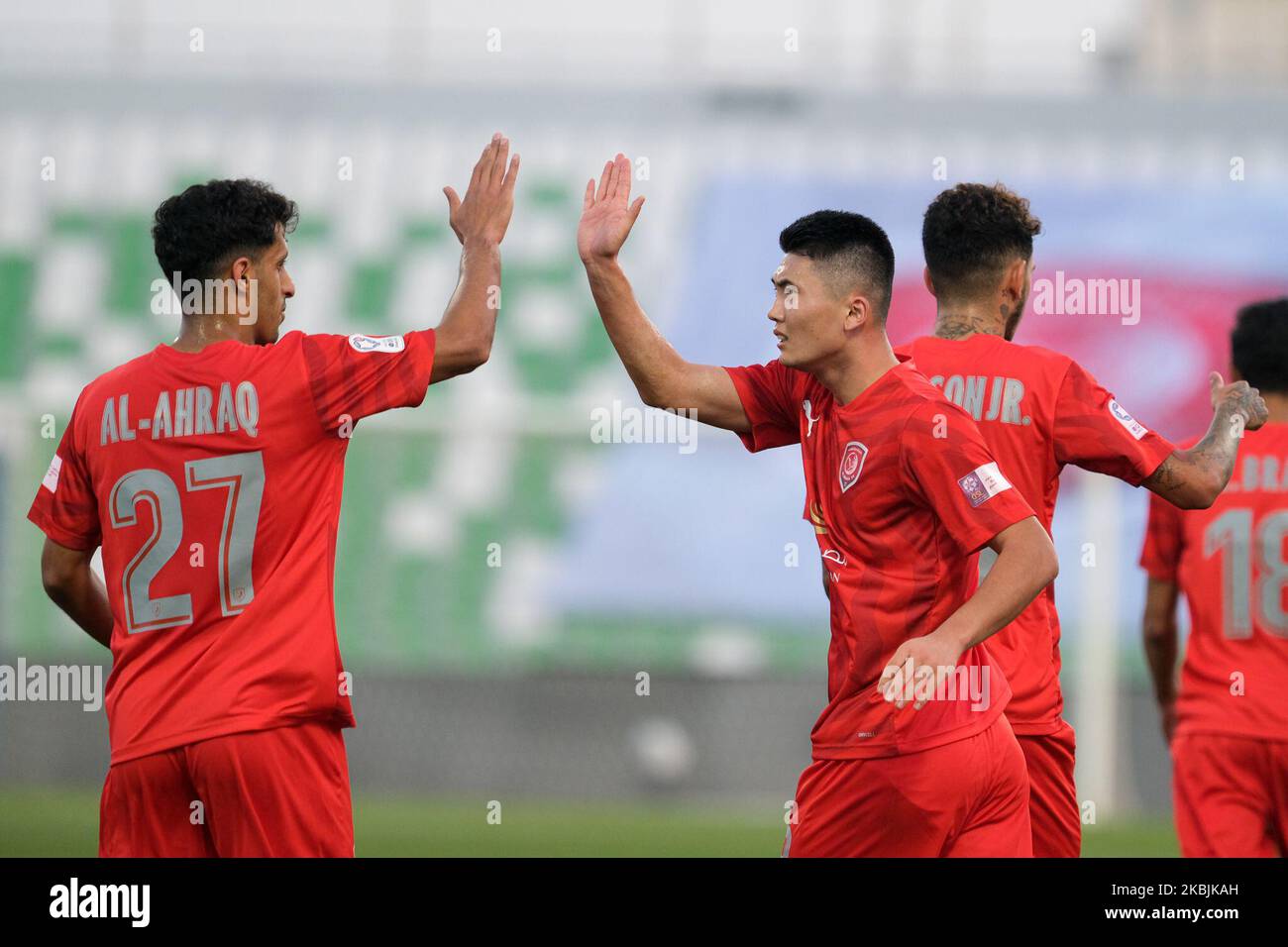 Han Kwang-song of Al Duhail celebrates scoring the opening goal with ...