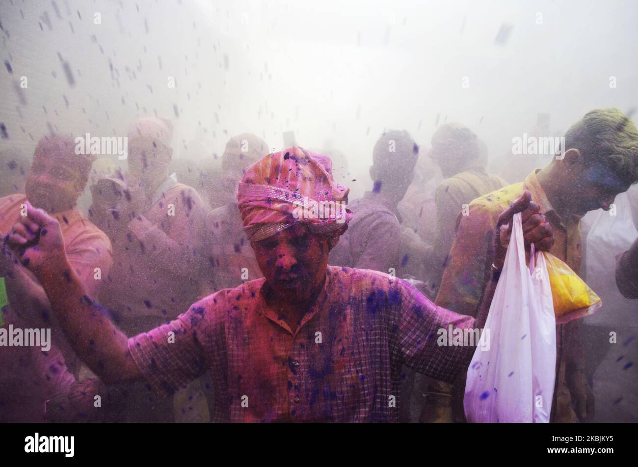 A Hindu devotee dance during the celebration of the Holi festival in ...