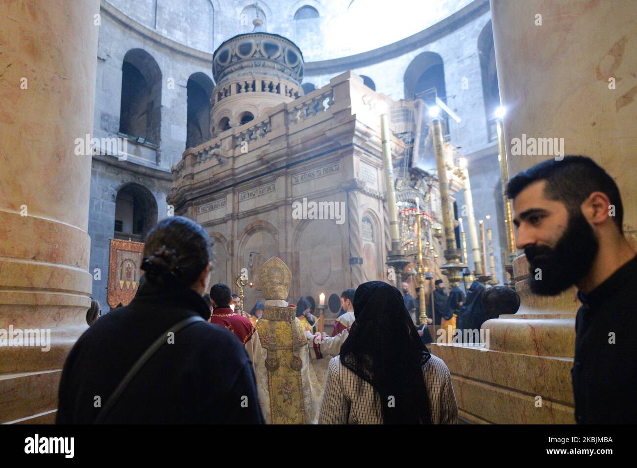 Members of the Armenian Church and pelgrims led by Archbishop Sevan Gharibian, the Grand ...