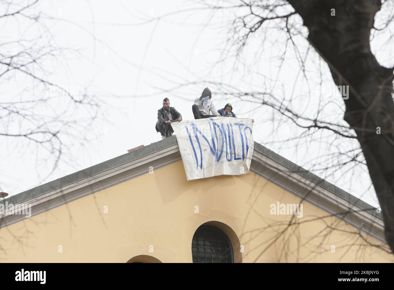 Inmates stage a protest on a rooftop of a wing at the San Vittore ...