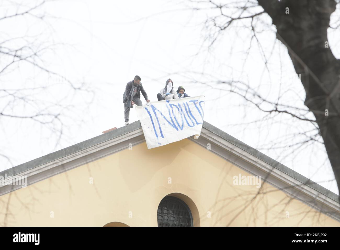 Inmates stage a protest on a rooftop of a wing at the San Vittore ...
