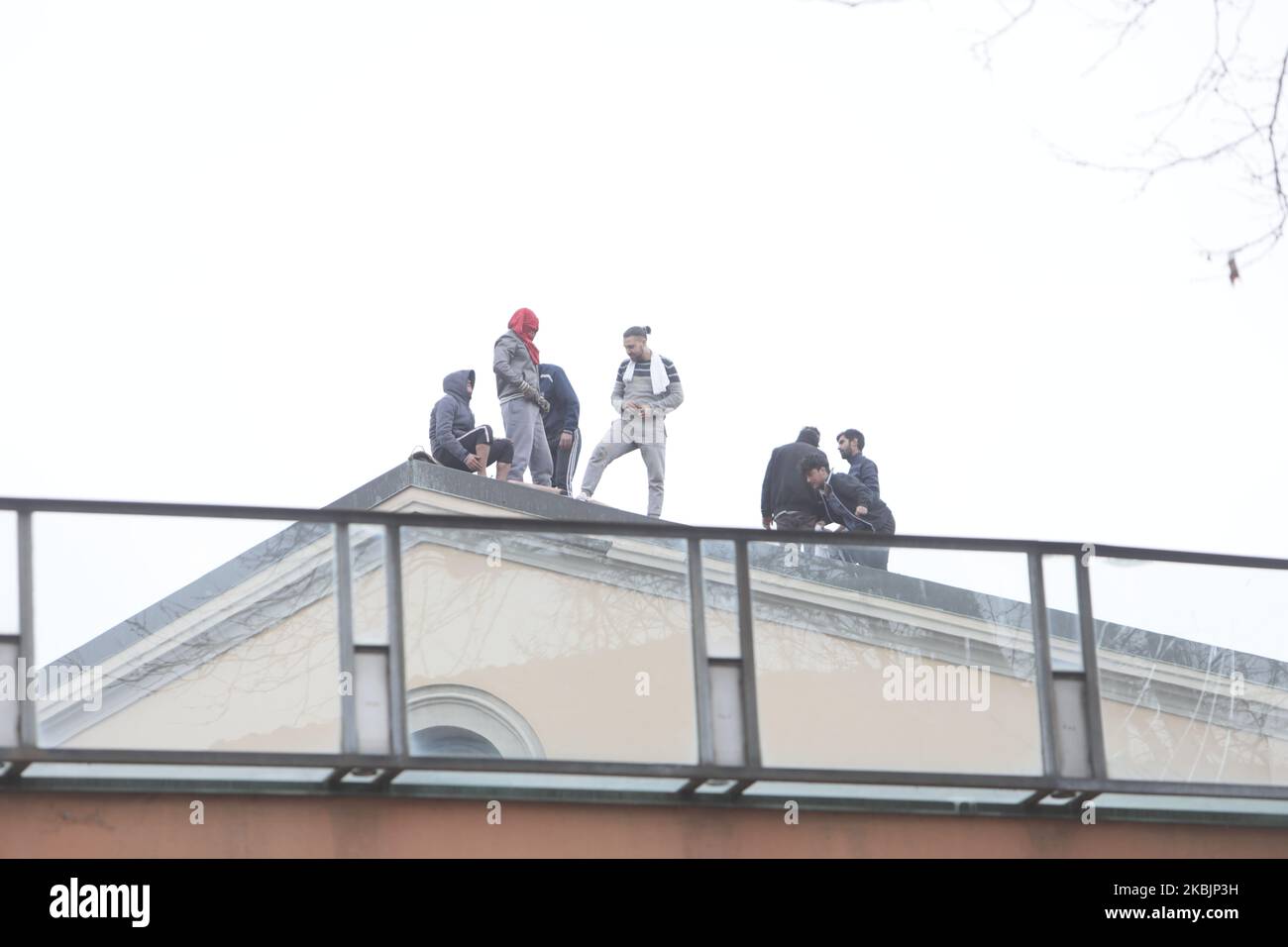 Inmates stage a protest on a rooftop of a wing at the San Vittore ...