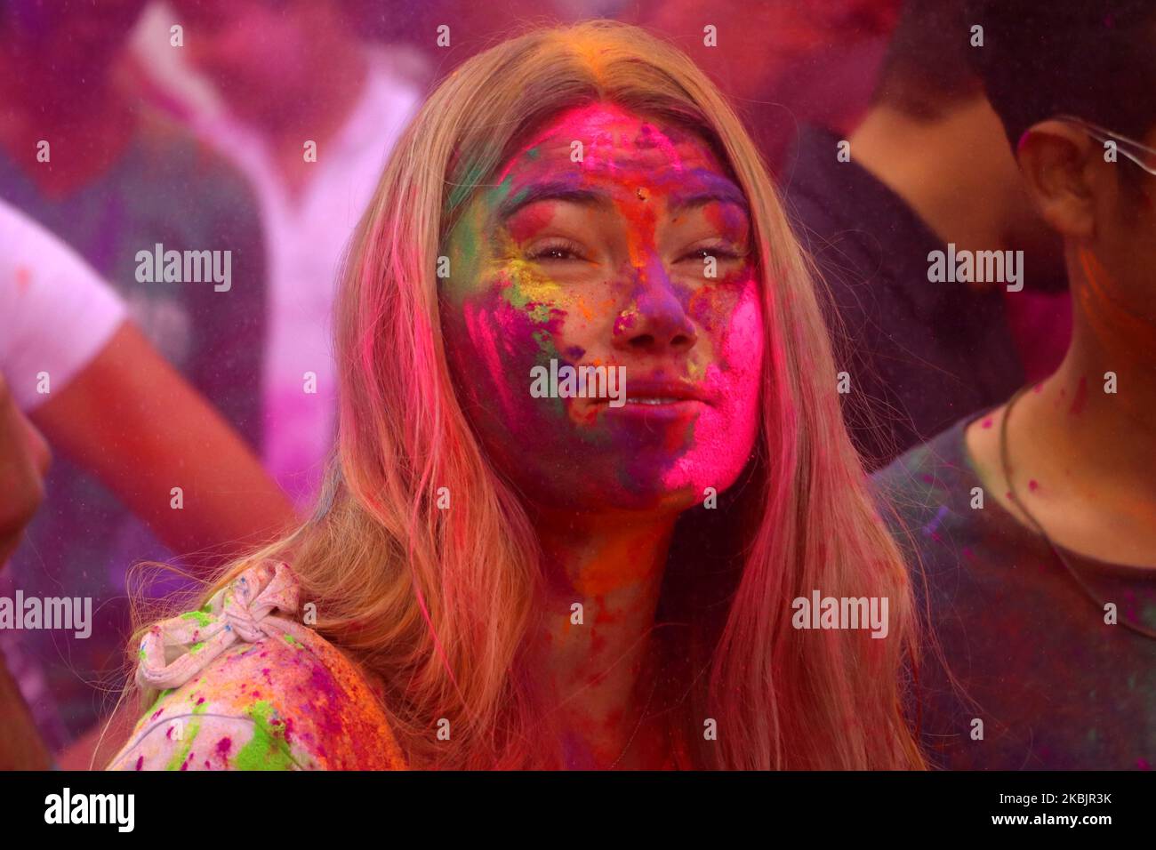 Hindu Devotees and Foreign tourist smeared in colour powder celebrates ...