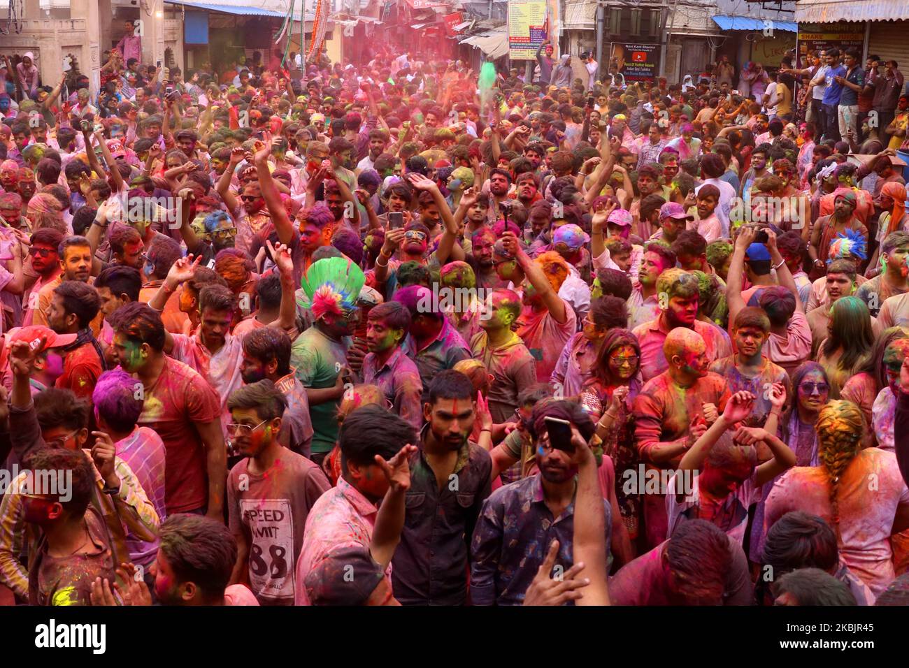 Hindu Devotees and Foreign tourist smeared in colour powder celebrates ...
