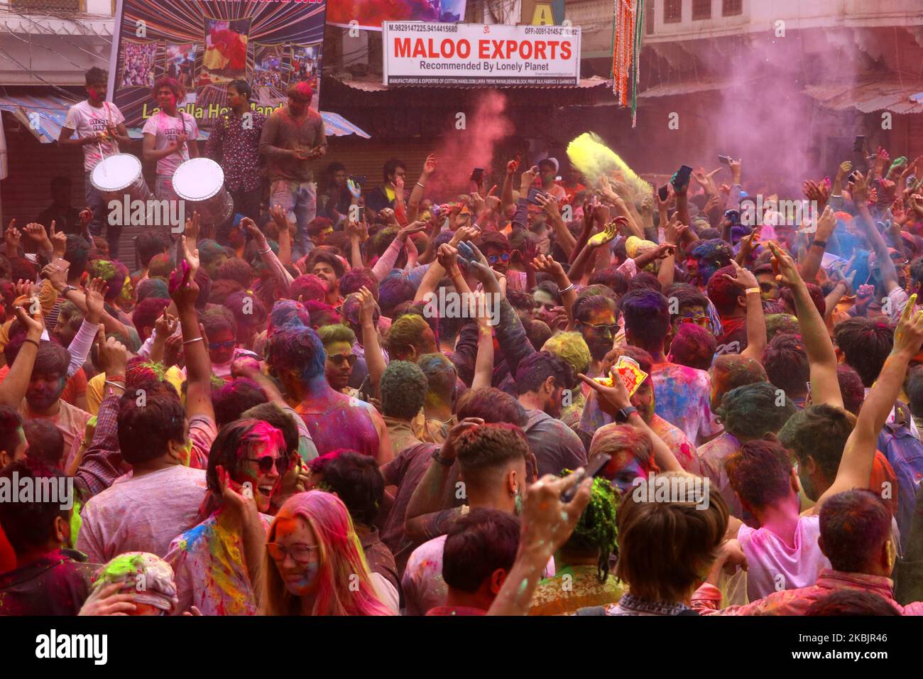 Hindu Devotees and Foreign tourist smeared in colour powder celebrates ...