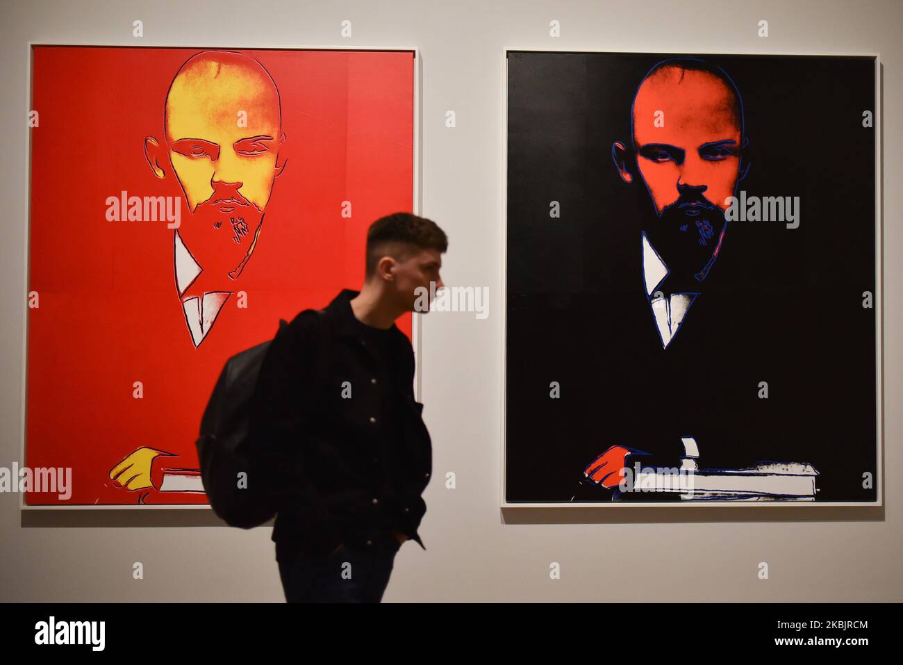 A gallery assistant poses with an arwork entitled "Lenin, 1986" by US ...
