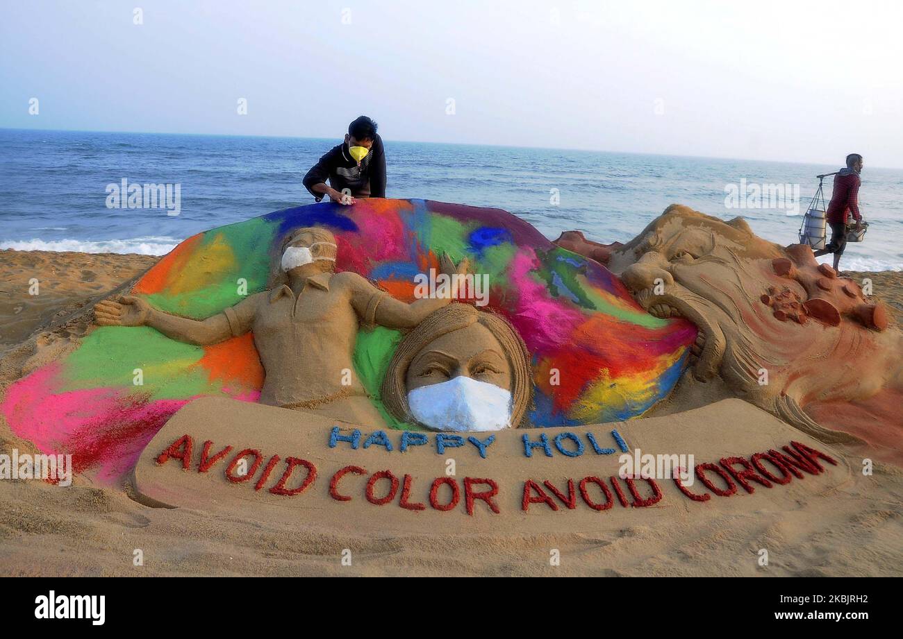 A sand sculpture about the Coronavirus and protection awareness for the ...