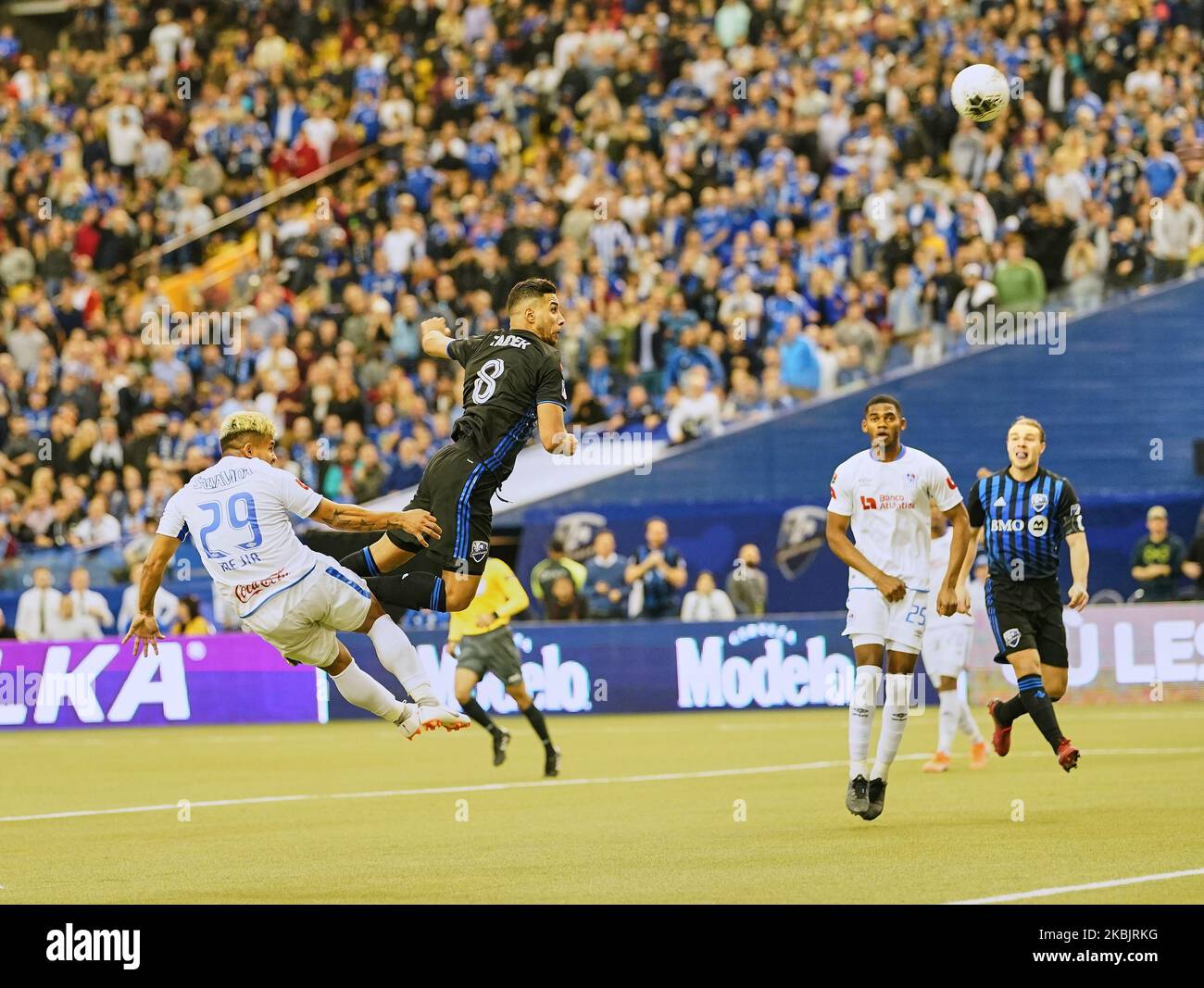 Saphir Taider of Montreal Impact heading on goal during the CONCACAF ...