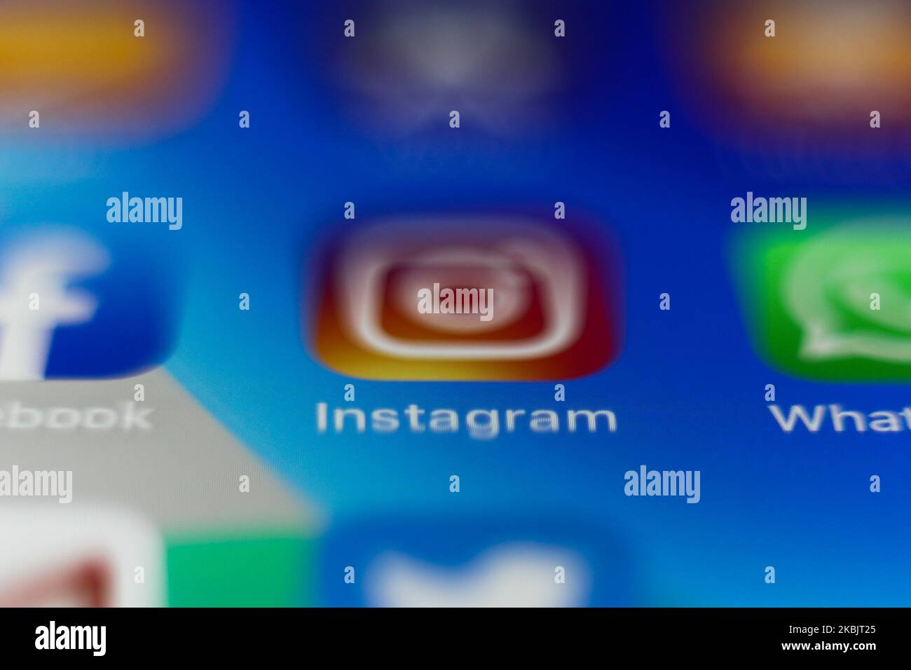 Instagram logo is seen displayed on smartphone in this illustration ...