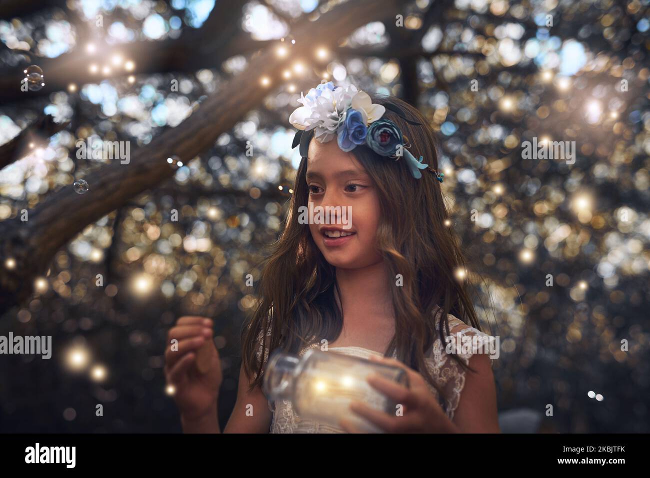 Days become magical when the fireflies come out to play. a little girl ...