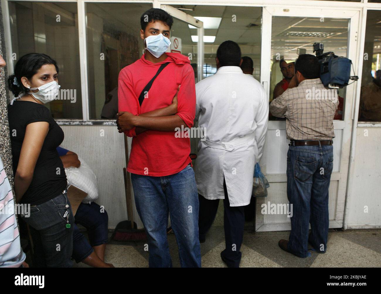 People wearing a protective mask in Caracas, Venezuela, on March 12 ...