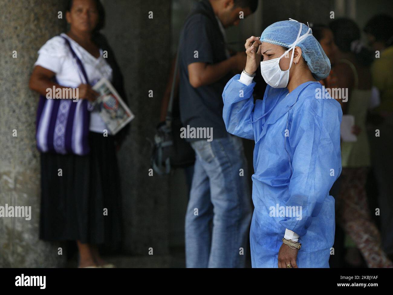 People wearing a protective mask in Caracas, Venezuela, on March 12 ...