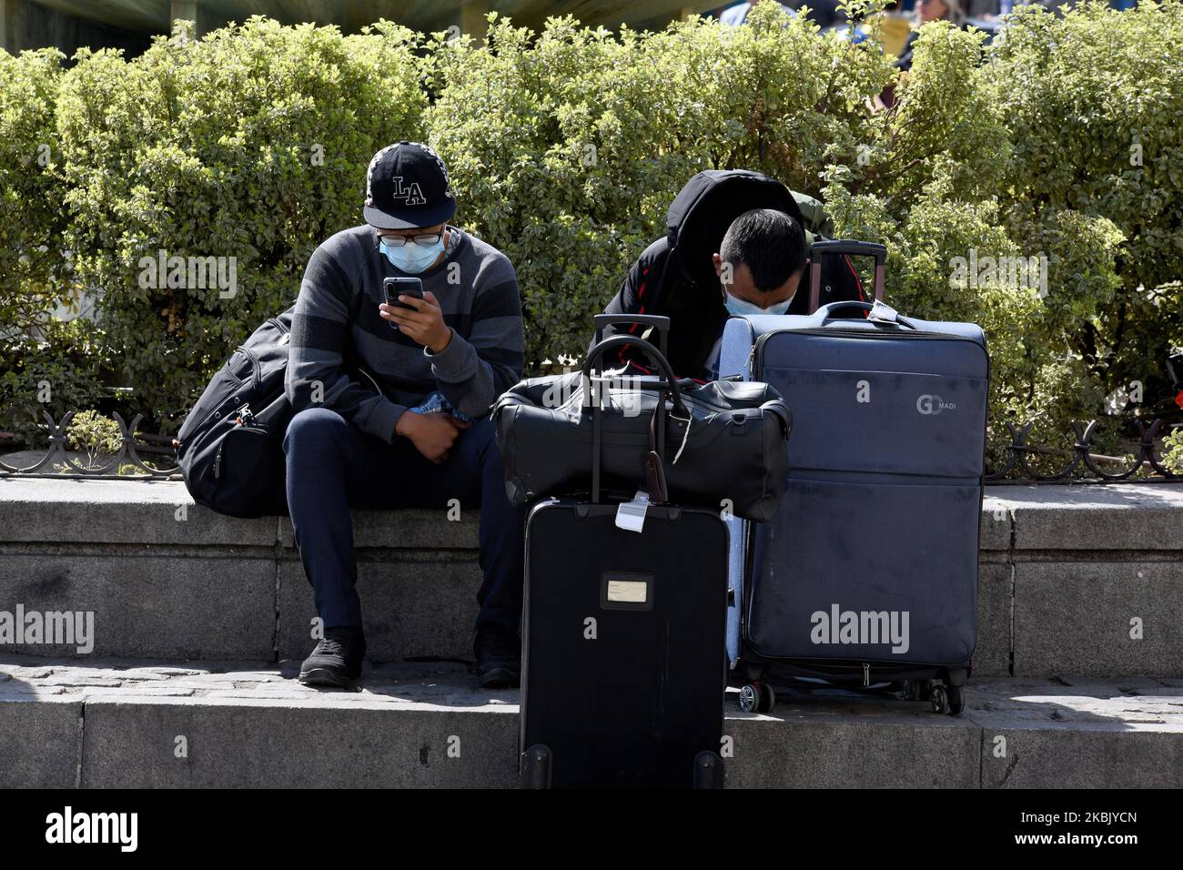 Two tourists wearing face mask as a precaution against coronavirus ...