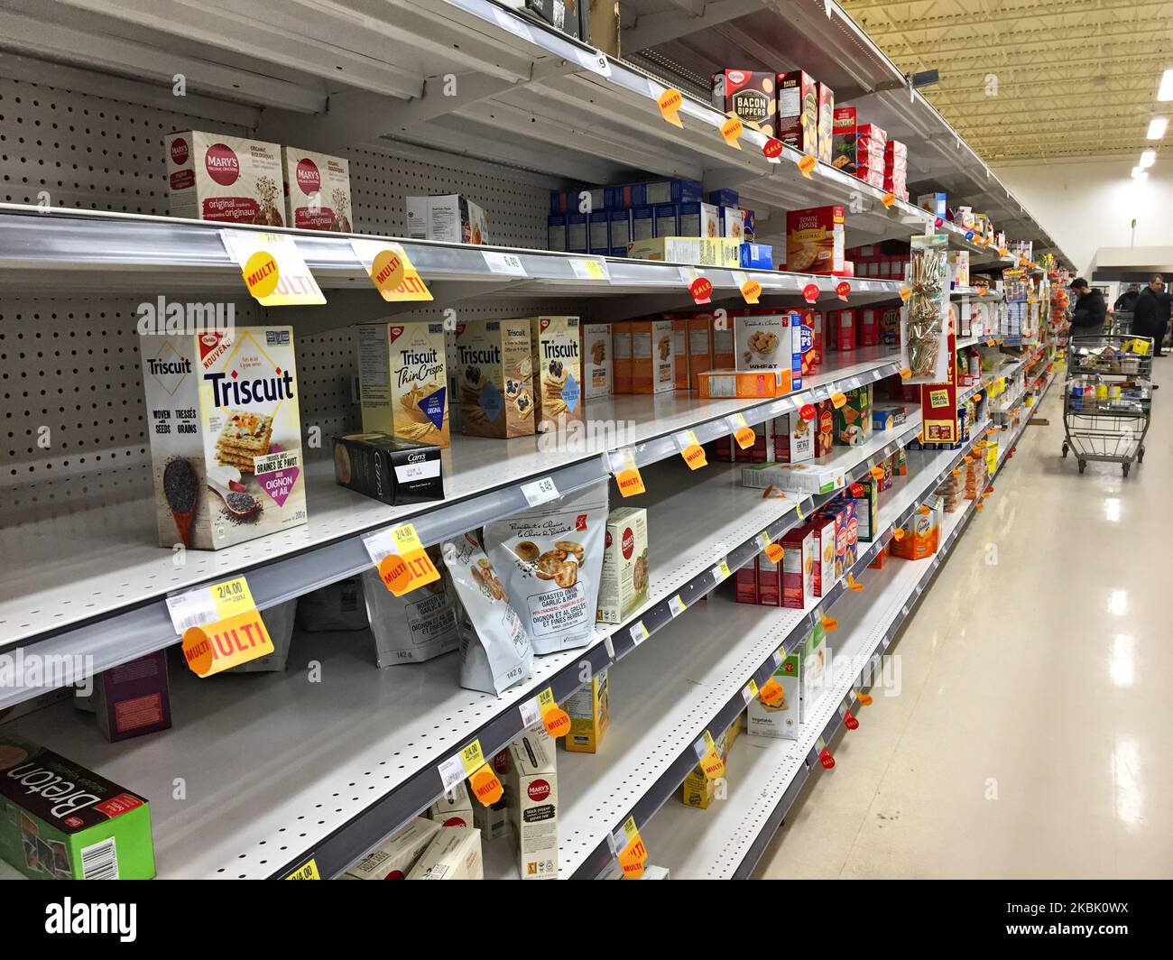 Nearly empty shelves at a grocery store on March 13, 2020 in Toronto ...