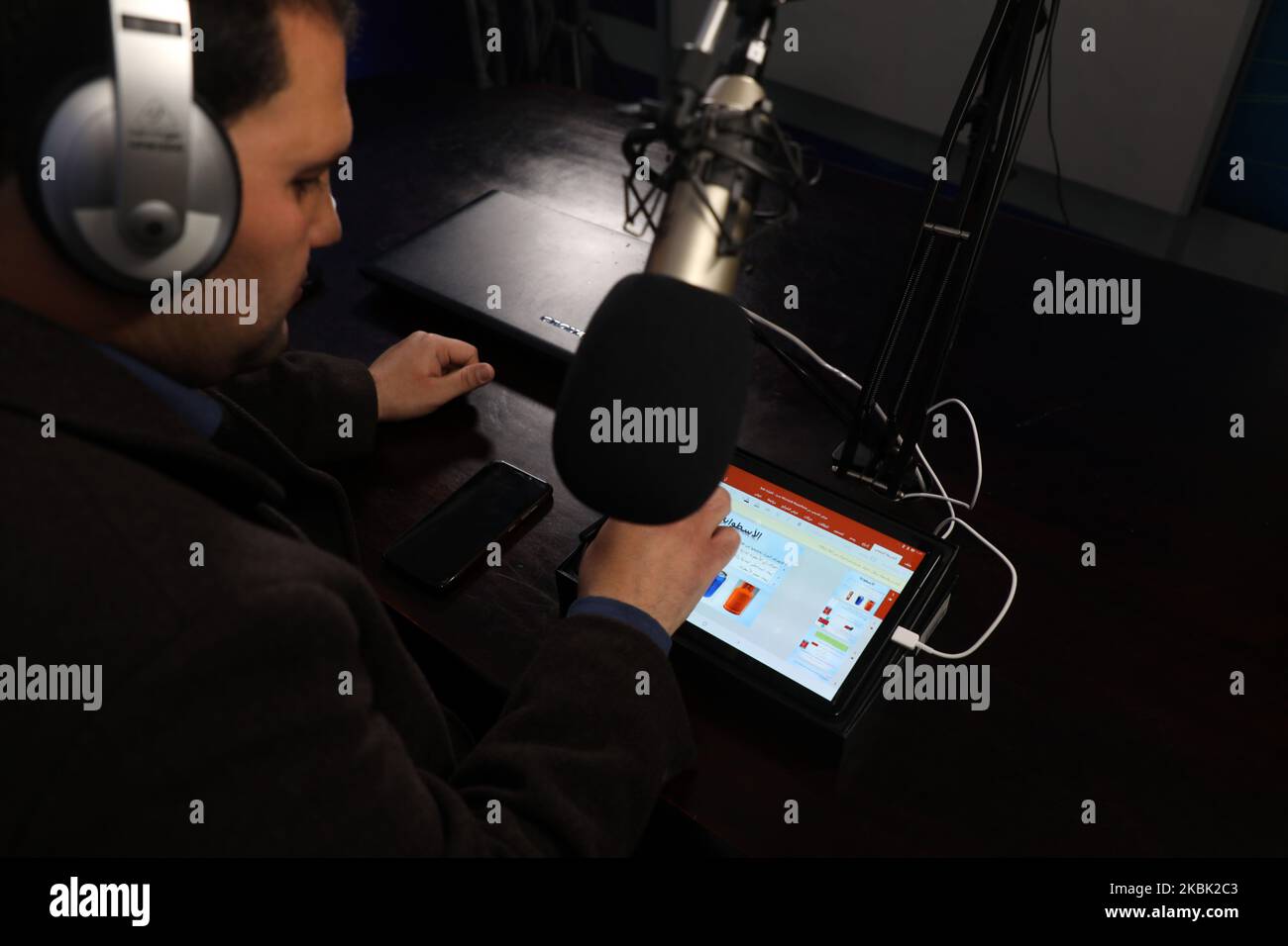 A Palestinian teacher broadcasts an electronic lesson on the Education ...